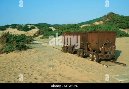 Tipper Lorries and sand dunes, Piscinas, Costa Verde, Sardinia, Italy ...