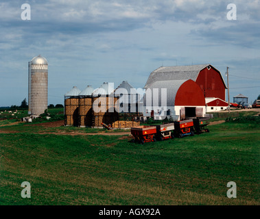 Wisconsin dairy farm with classic features such as tall silo and red ...