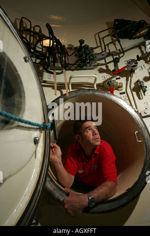 Divers training inside a hyperbaric chamber Stock Photo - Alamy