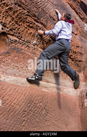 Businessman climbing career ladder in business concept Stock Photo - Alamy