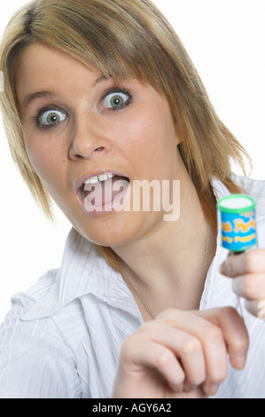 Young girl pulling a party popper Stock Photo - Alamy