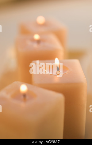Romantic lighted candles close up Stock Photo - Alamy