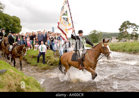 Traditional Scottish event Langholm Common Riding cornet charging on ...