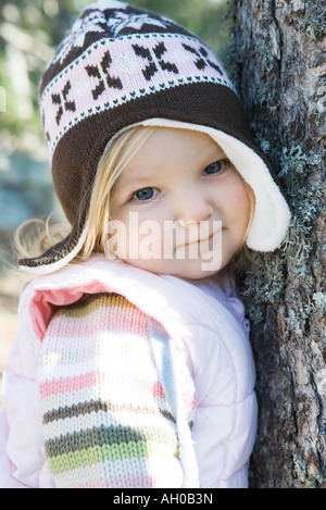 Toddler child in warm vest jacket outdoors. Baby boy at playground ...