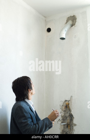 checking air ducts in a home hvac system Stock Photo - Alamy