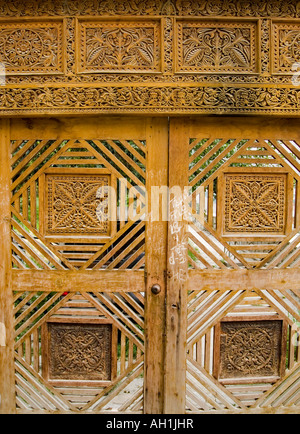 ornate detailed woodwork on a set of doors Hunza Pakistan Stock Photo ...