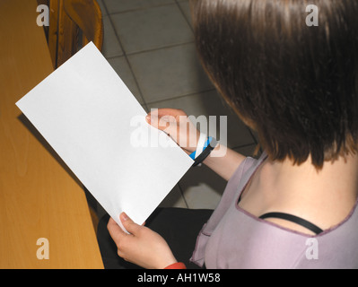 Person Staring at a Blank Sheet of Paper Stock Photo - Alamy
