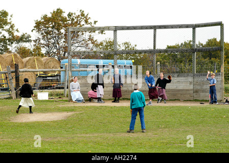 Amish school children playing baseball at school in Amish Country, Ohio ...