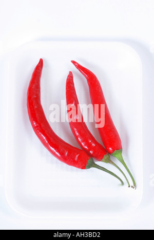 Red chili in foam and plastic package Stock Photo - Alamy