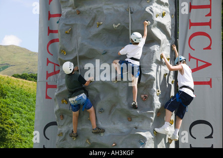 child on a bungee machine at Ambleside sports, Lake district, UK Stock ...