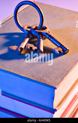 Antique Books And Key Stock Photo - Alamy