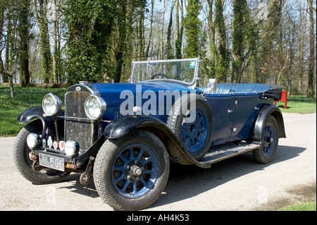 Humber blue open top old vintage sports car from behind at speed with ...
