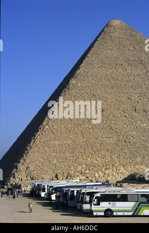 Tourist tour bus and the Great Pyramid of Khufu (Cheops) at the ...