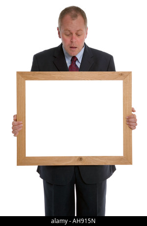 The businessman in office holding a blank message board Stock Photo - Alamy