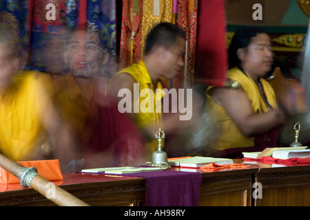 Tibetan monks chanting inside a monastery. Boudhanath stupa ...
