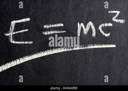 Famous Albert Einstein's equation E=mc2 handwritten on blackboard Stock ...