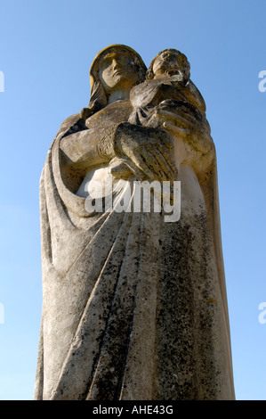 Statue of Mother Mary and Baby Jesus Christ on lap. With junior ...