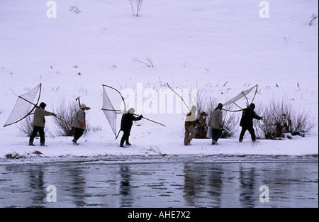 Villagers fishing in frozen Euphrates River, Mus Turkey Stock Photo - Alamy