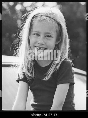 A pretty little girl with gappy teeth Stock Photo - Alamy
