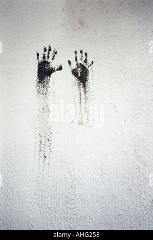 white graffiti hand prints on rock Stock Photo - Alamy
