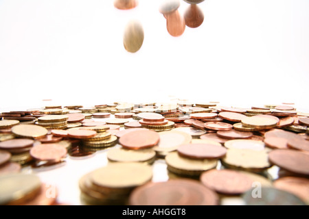 lots of coins symbolize money rain Stock Photo - Alamy