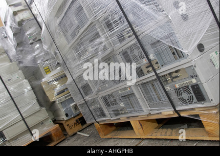 pile of computer system boxes pallet wrapped sitting on wooden pallet ...