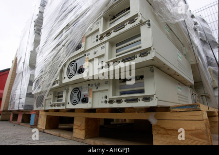 pile of computer system boxes pallet wrapped sitting on wooden pallet ...
