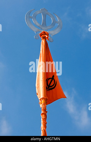 Sikh flag or Nishan Sahib flying outside a Sikh temple or Gurdwara ...