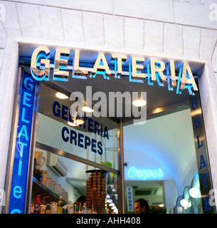 Storefront of CREAM ice cream shop with blue and yellow facade, open ...