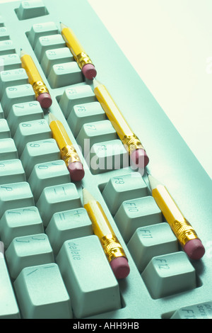 Pencils by keyboard Stock Photo - Alamy