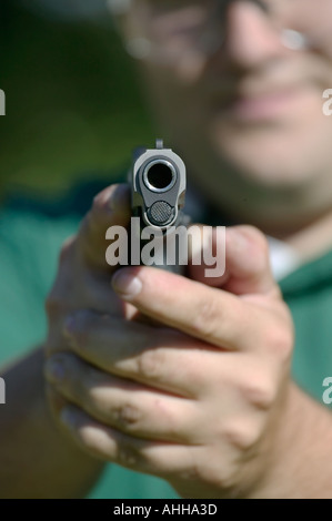 Shooting with a .45 Caliber Pistol at a Target: Capturing Precision and ...