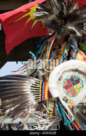 eastern Canadian Natives dressed in traditional dress dancing and ...