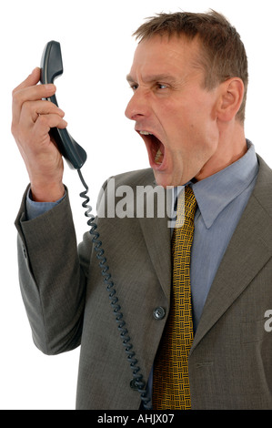 An angry businessman shouting down the phone Stock Photo - Alamy