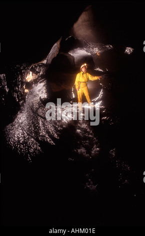 Female caver in a streamway in a South Wales cave UK Stock Photo - Alamy