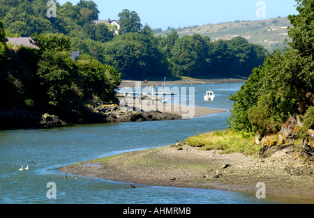 Boats moored in the River Teifi estuary looking upstream to Cardigan at ...