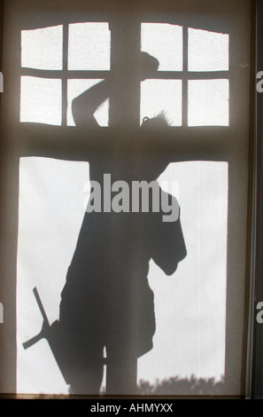 Window cleaner in silhouette Stock Photo - Alamy