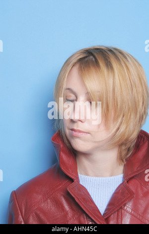 Happy gen z girl with blond hair wearing sunglasses looking at camera ...