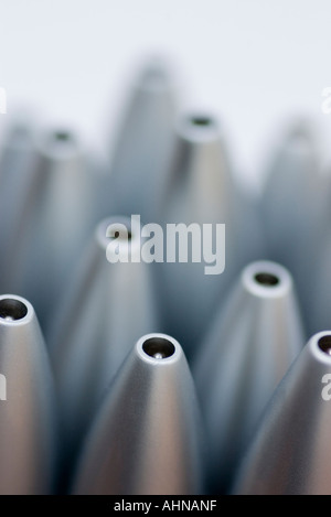 metal tips for the ink pen on a white background in solar rays ...