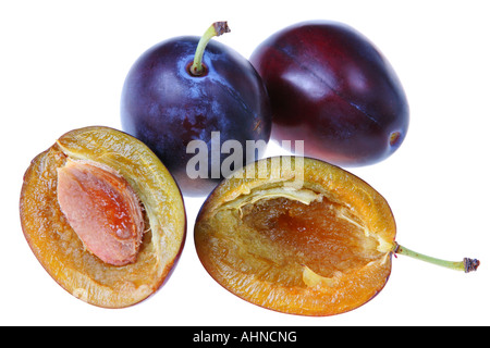 Detail plum with slice on white background Stock Photo - Alamy