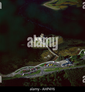 An aerial view of Eilean Donan Castle in the Scottish Highlands on a ...