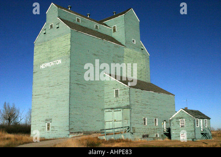 Horizontal Grain elevator trucks and train tracks Stock Photo - Alamy