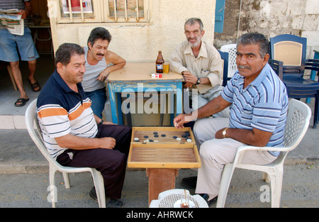Men playing backgammon outside cafe Famagusta Turkish Republic of ...