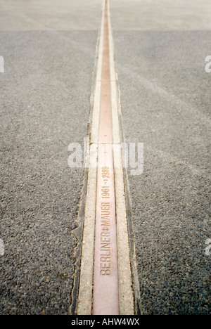 Historic route of the Berlin Wall Berliner Mauer marked by a sign on ...