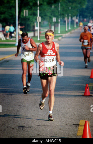 Active 60 year old male - lifting weights at home Stock Photo - Alamy