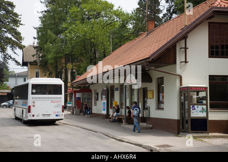 Bled Bus station in summer with single decker bus parked and people ...