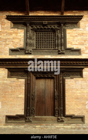 Intricately carved wooden door and window in Newari style, Kathmandu ...