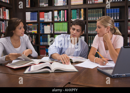 College students studying in library Stock Photo - Alamy