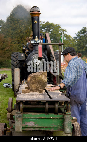 A saw bench powered by A steam traction engine Stock Photo - Alamy