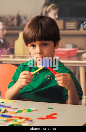 child photographed in a preschool classroom in suburban Connecticut ...