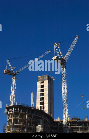 Cranes building Altolusso apartment tower block under construction in ...